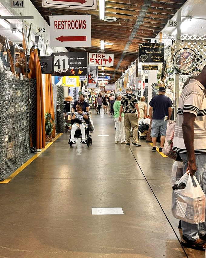 The indoor thoroughfare where accessibility meets antiquity. Wide aisles welcome all treasure seekers, with numbered stalls making "I'll meet you at booth 41" a common refrain.