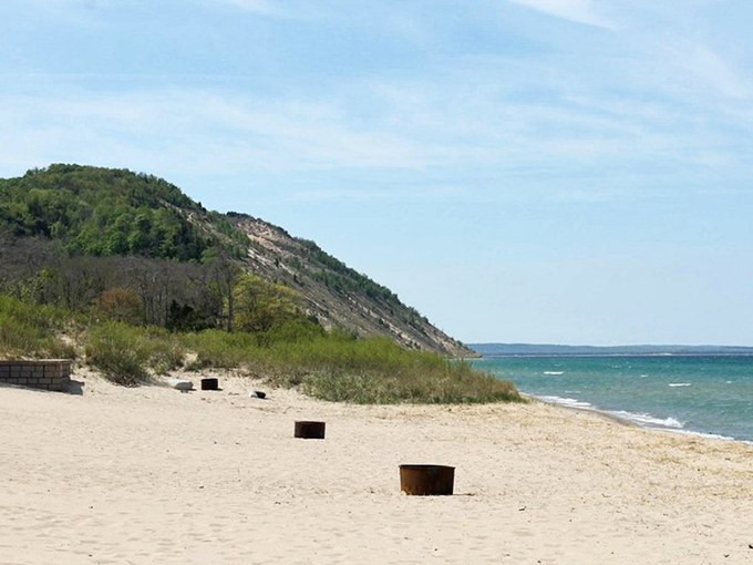 Fire pits dot the shoreline like period marks at the end of perfect summer sentences. The sand here doesn't just get between your toes&mdash;it gets between your worries.