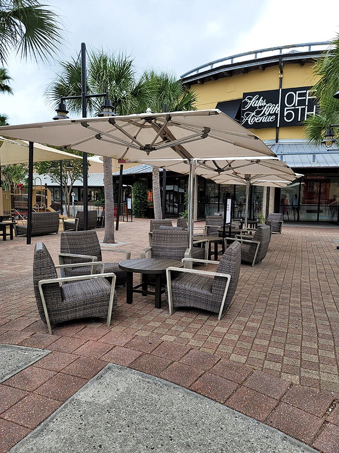 When shopping fatigue strikes, these shaded havens offer respite. The perfect spot to rest your feet while contemplating whether you really need those shoes. (You do.)
