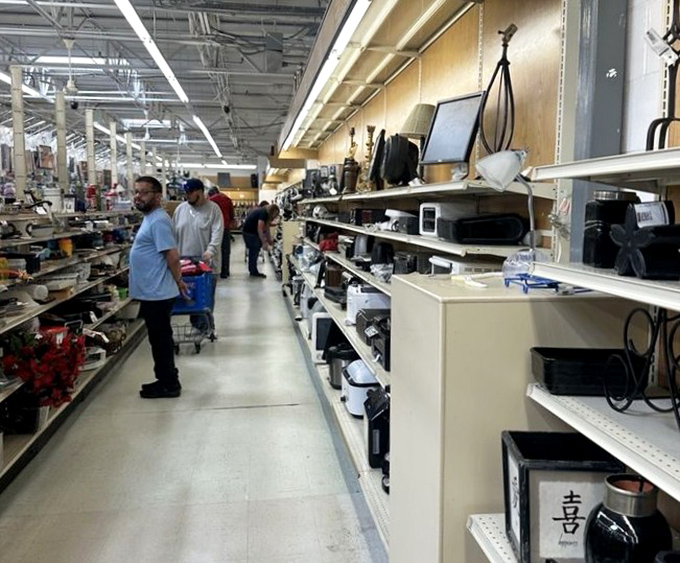 The electronics aisle: where one person's obsolete gadget becomes another's vintage find. That Bluetooth speaker might just have a few good tunes left in it!