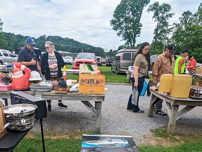 The outdoor tables transform into stages where everyday objects perform their second act, with shoppers as the eager audience.