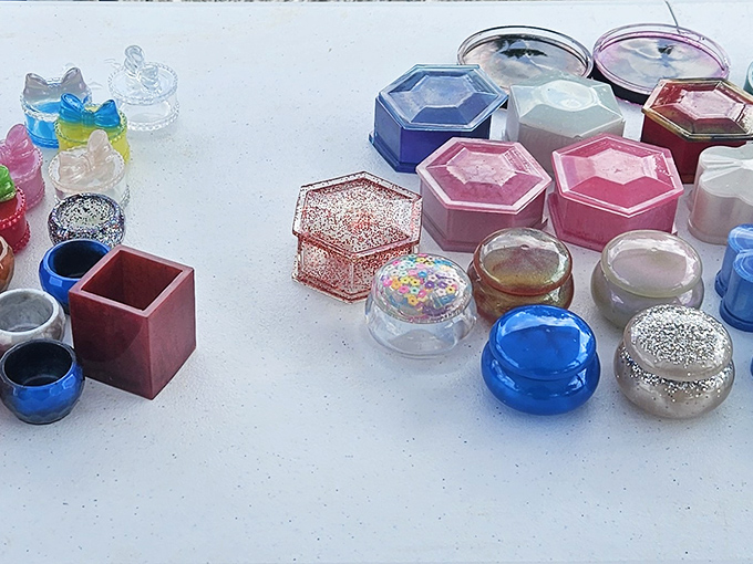 Tiny treasures with big potential. These colorful resin trinket boxes could become someone's prized jewelry holders or desk conversation pieces.