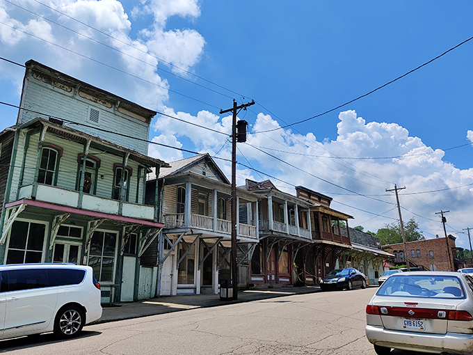 The wooden porches along this stretch of Shawnee look like they're waiting for someone to sit a spell and watch the world go by.