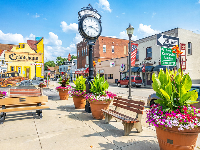 The town clock stands sentinel over Mill Street, where flower-filled planters and welcoming benches invite you to slow down and savor the day.