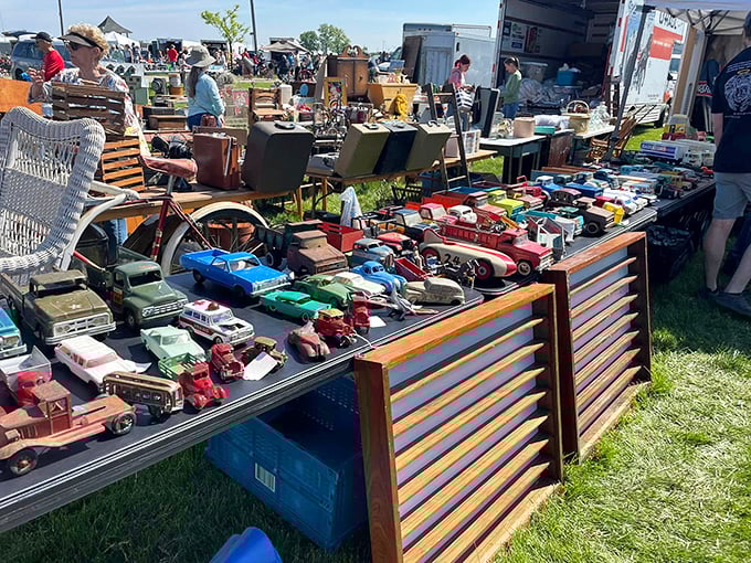 Miniature cars lined up like a time-traveling dealership. These tiny vehicles carry oversized nostalgia, each one a childhood memory waiting to be reclaimed.