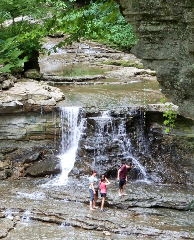 Mother Nature's splash pad. Families cool off at the waterfall, creating memories that will outlast any souvenir t-shirt from a crowded tourist trap.