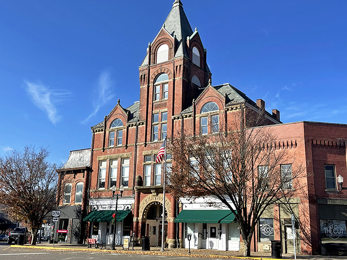 The Twin City Opera House isn't just a building but a time machine, its brick tower standing sentinel over generations of community performances and gatherings.