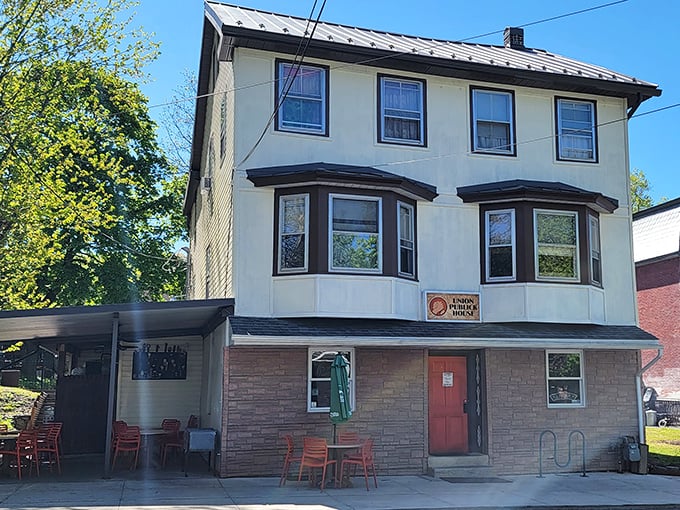 The Union Publick House offers that perfect blend of historic charm and modern comfort. Those orange chairs are basically saying, "Sit here, have a beer, forget about your inbox."
