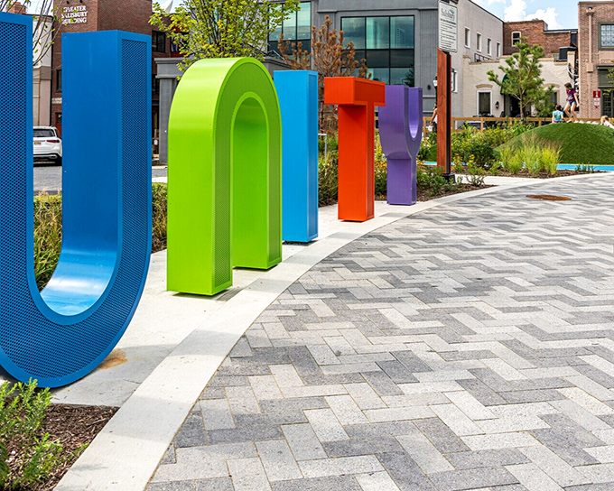 The colorful UNITY installation isn't just Instagram bait—it's Salisbury's way of saying "we're small but mighty vibrant" in five bold letters.