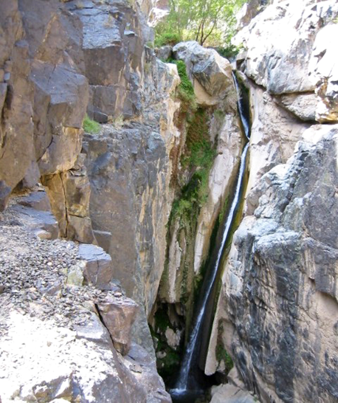 Water slicing through ancient rock like a hot knife through butter&mdash;except this took millions of years and nobody's waiting for toast.