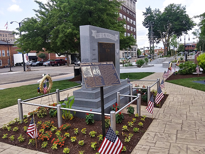 The Veterans Memorial Park offers a solemn reminder of service and sacrifice, surrounded by carefully tended gardens and American flags.