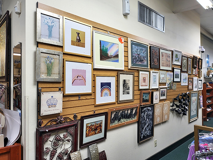 The art wall transforms discarded frames and forgotten prints into a gallery of possibility&mdash;someone's rejected landscape might be your living room's missing piece.