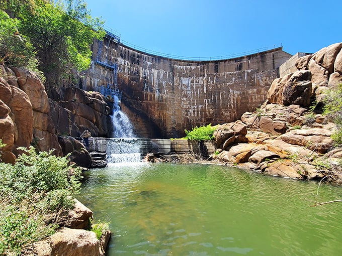 Watson Lake's dam creates a postcard-worthy cascade. Nature and engineering having a friendly conversation that's been going on for decades.