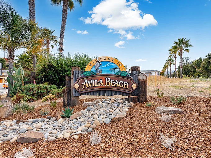 The welcome sign says Avila Beach, but it might as well read "Stress-Free Zone Ahead" &ndash; palm trees included at no extra charge.