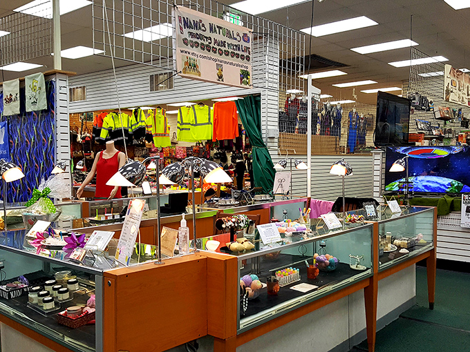 Vendor stalls create a kaleidoscope of color and merchandise &ndash; each glass case a miniature museum of potential purchases.