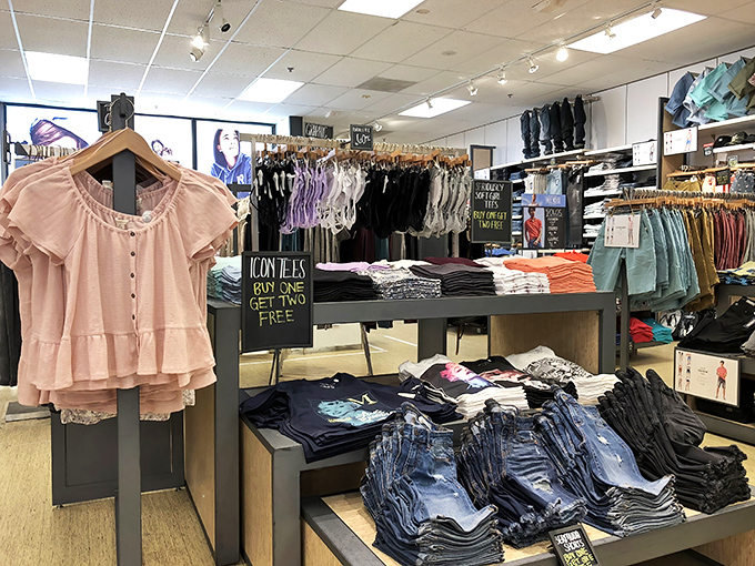 "Buy one, get two free" isn't just a sign—it's practically poetry. Casual fashion arranged with care that belies the bargain prices.