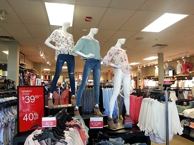 Women's fashion displays that whisper, "Yes, you can look this good for 40% off." The mannequins always seem to know something we don't.