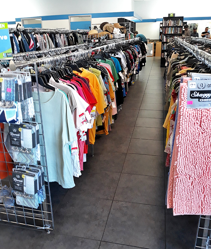 The clothing section stretches toward infinity, a kaleidoscope of colors and possibilities where yesterday's fashion finds tomorrow's admirers.