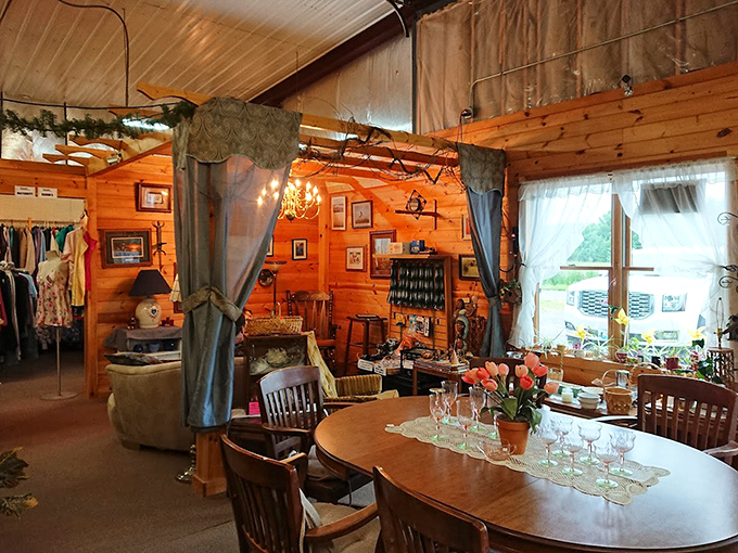 Wooden walls and warm lighting transform this section into a cozy cabin retreat, where every chair seems to say, "Sit a spell."