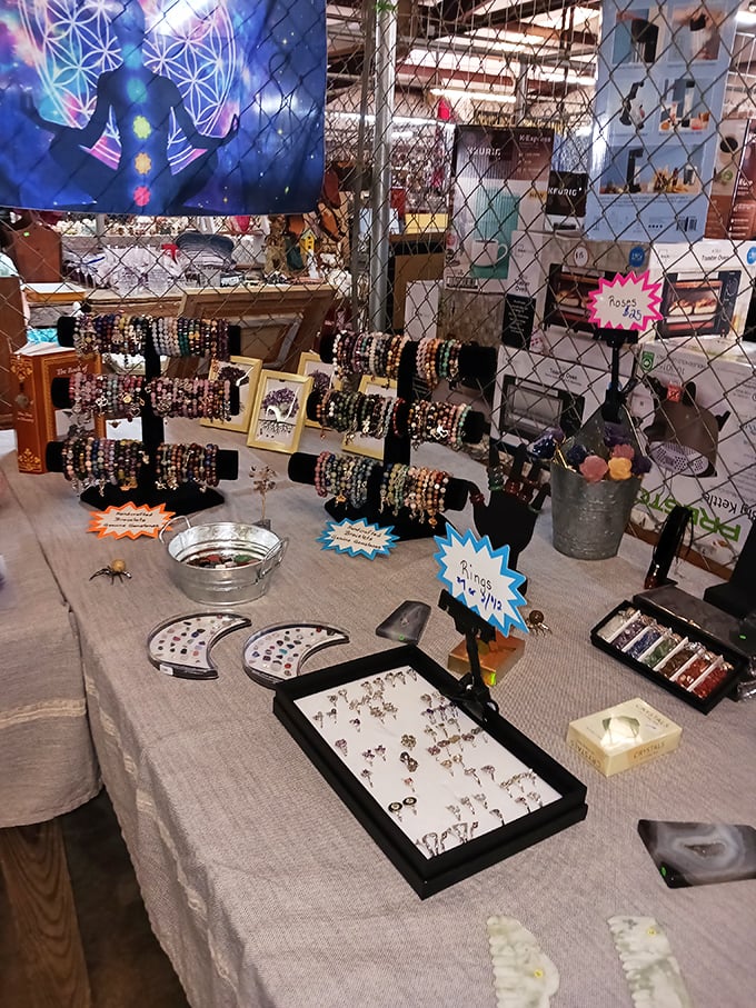 Colorful beaded bracelets and spiritual trinkets line this vendor's table, offering both adornment and perhaps a touch of cosmic protection for the superstitious shopper.