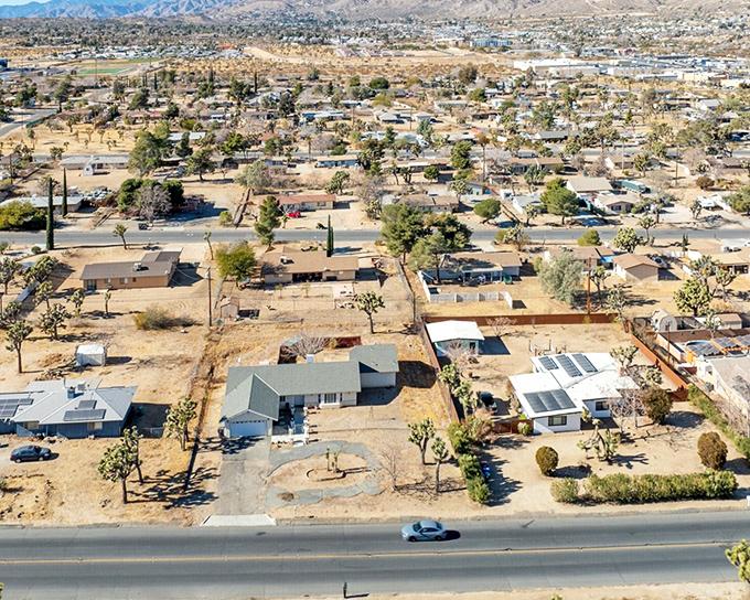 The desert grid! From above, Yucca Valley reveals its orderly charm &ndash; affordable homes with breathing room, where your retirement dollars stretch as far as the horizon.