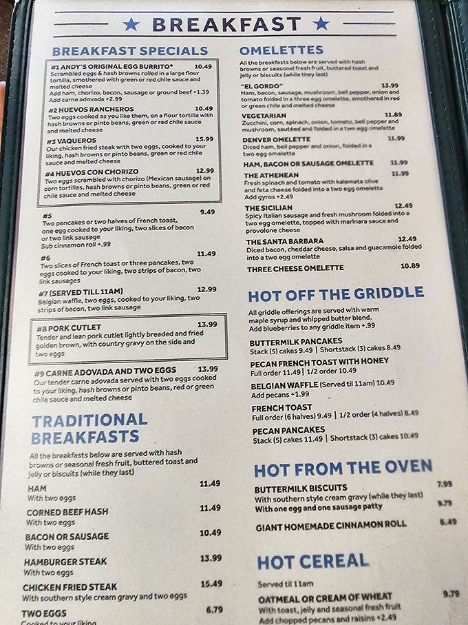 This menu is like a roadmap to breakfast paradise. The chicken fried steak listing quietly waits to change your life.