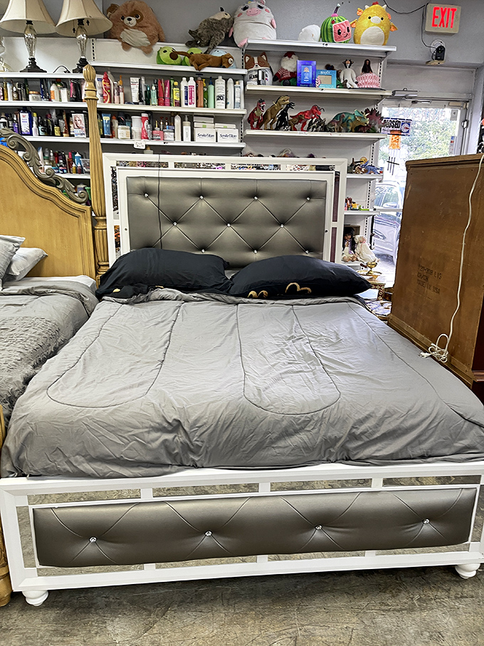 Sleep like royalty without the royal price tag. This tufted silver headboard might have witnessed decades of bedtime stories before finding its way here.
