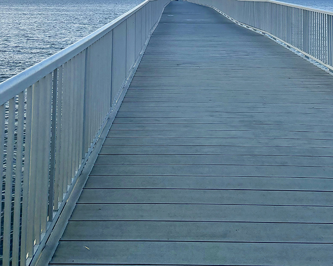 Walking this pier feels like stepping into infinity, with nothing but blue horizons and possibilities ahead.