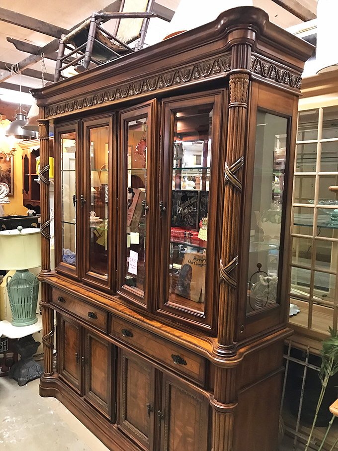 This isn't just furniture; it's functional art. The intricate woodwork on this china cabinet tells stories from another era.