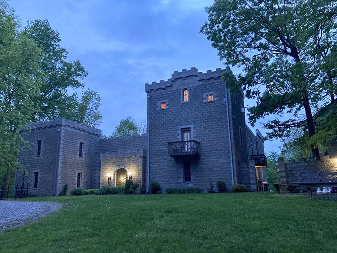 As dusk settles over Ravenwood Castle, the illuminated windows hint at cozy chambers within&mdash;medieval on the outside, thankfully modern plumbing on the inside.