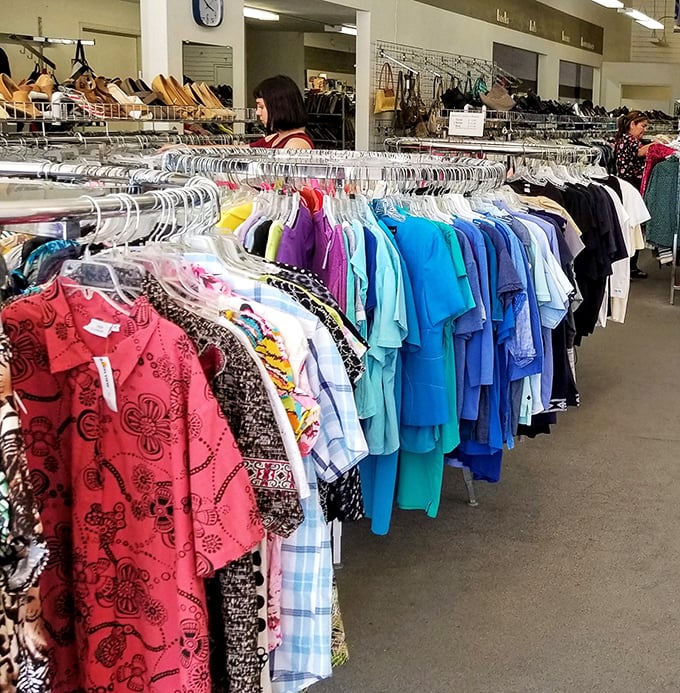 The rainbow of possibilities stretches as far as the eye can see. Each hanger holds someone's future favorite shirt or that perfect vacation outfit.