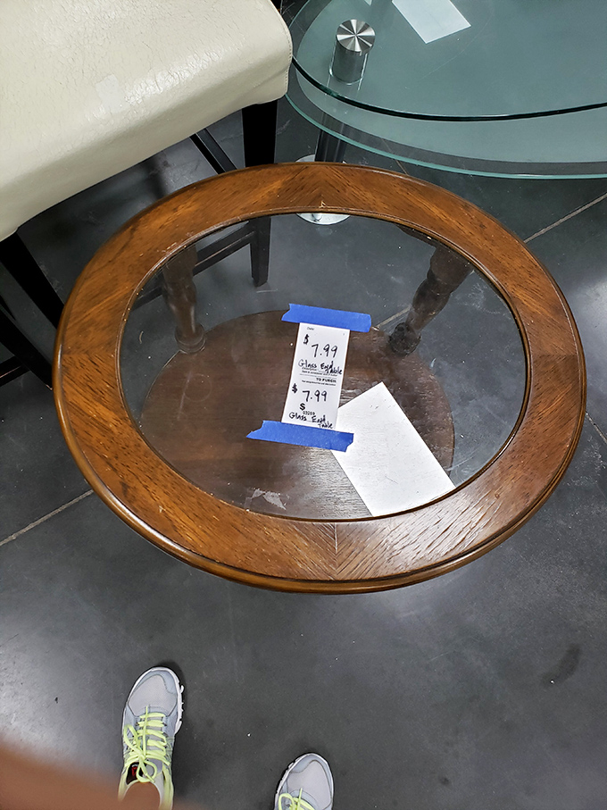 A solid wood coffee table with glass insert for less than a fancy latte. In retail stores, this beauty would command triple-digit respect.
