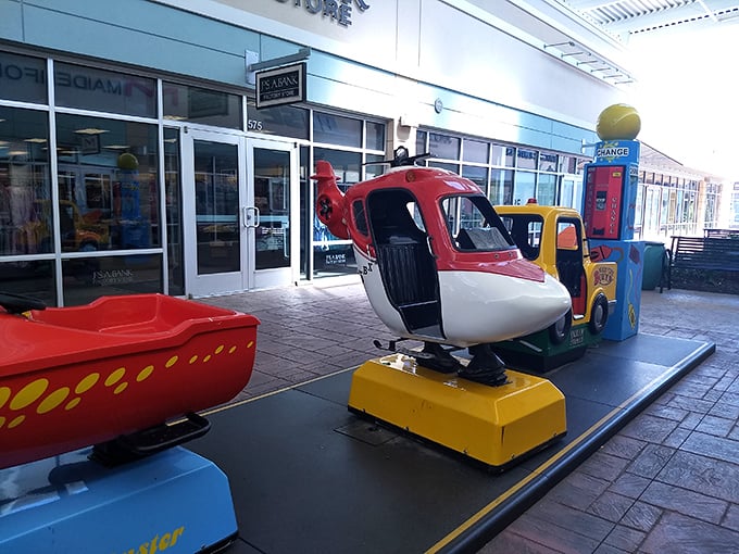Childhood joy meets parental shopping breaks. These colorful rides keep the little ones entertained while you debate whether to buy those discounted designer shoes.
