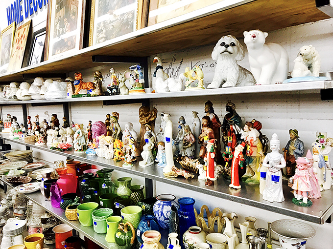 Porcelain personalities line the shelves, each figurine silently hoping you'll be the one to give it a second act.