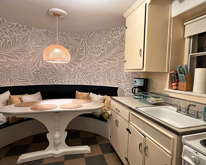 The kitchen nook proves that breakfast tastes better when your dining room follows the natural arc of footwear.