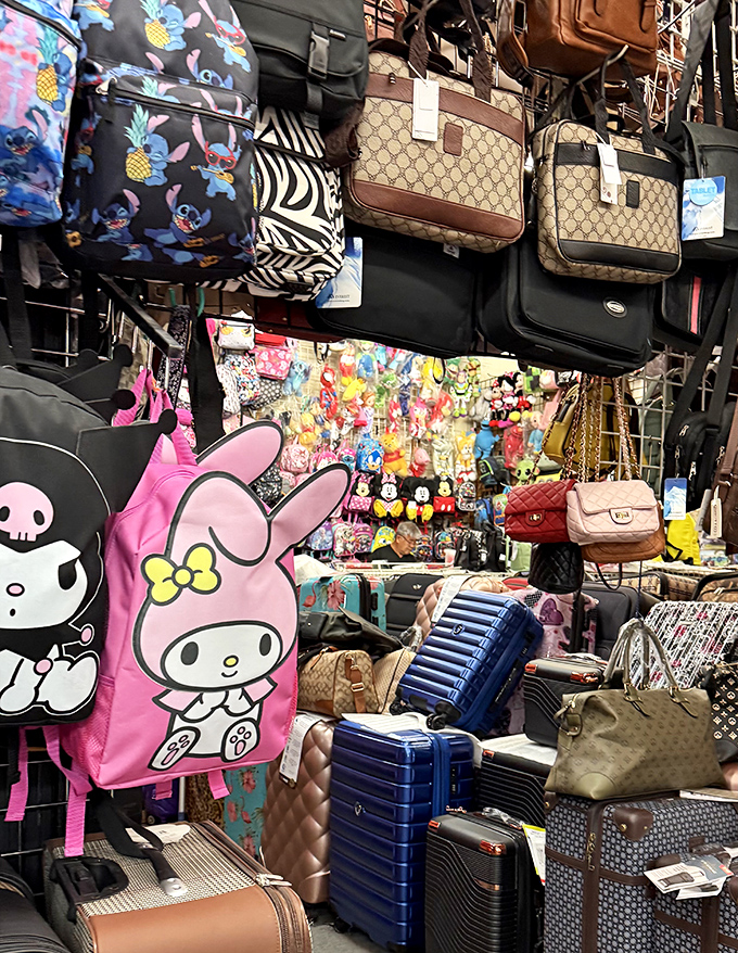 Handbags and backpacks galore! From Hello Kitty to designer-inspired styles, this wall of accessories proves one thing: you can never have too many bags. 