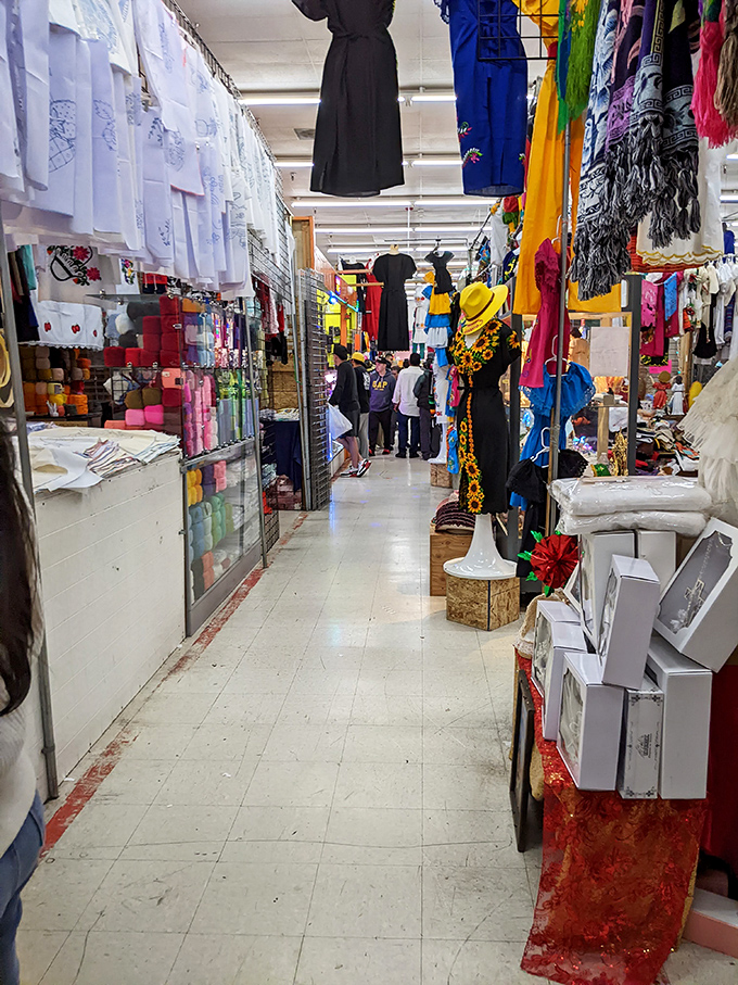 Narrow aisles become highways of discovery, where each rack of clothing tells stories spanning decades of fashion history.