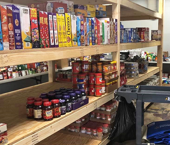 This isn't just a food pantry; it's a lifeline. Shelves stocked with essentials that transform donations into dignity.