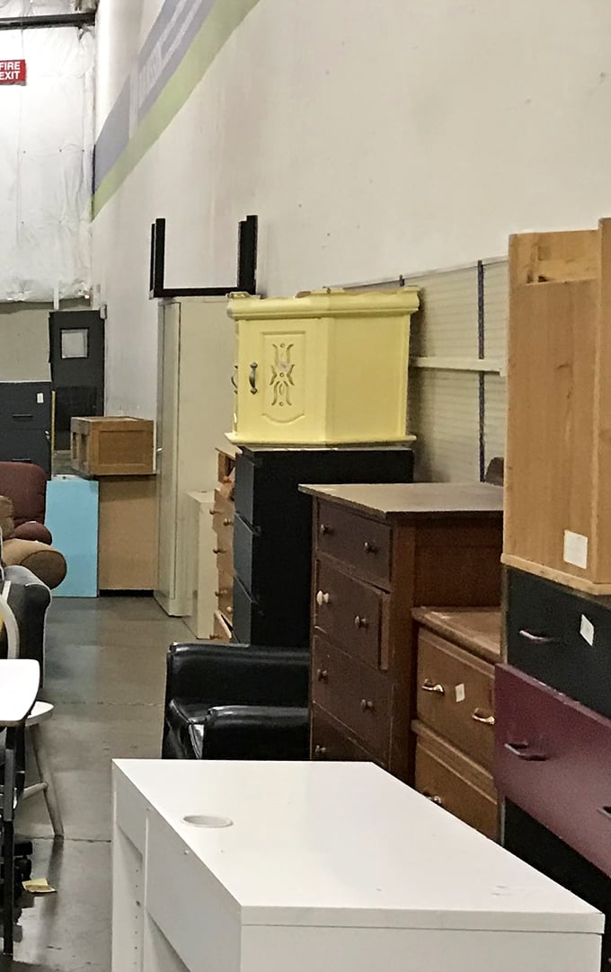 Furniture finds galore! One shopper's discarded dresser becomes another's vintage statement piece. That yellow cabinet is practically begging for a second act.