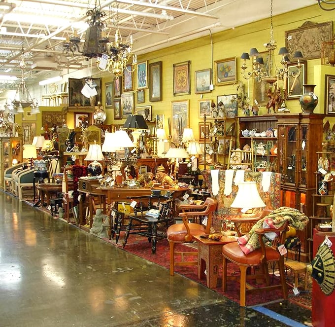 Treasure island for grown-ups! This golden-hued vendor booth showcases the organized chaos that makes antiquing both art form and treasure hunt.