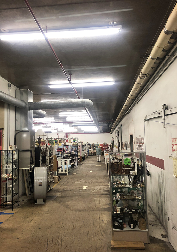 Long corridors of possibility stretch before you, where exposed pipes and industrial charm frame countless vendor stalls of potential discoveries.