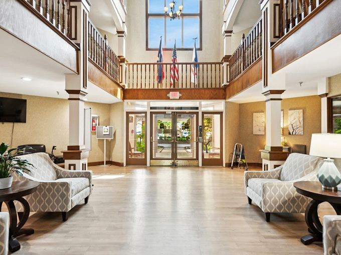 This entrance hall feels more "boutique hotel" than "senior living," with soaring ceilings that give your spirits room to rise along with them.
