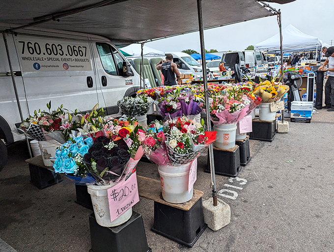 Fresh blooms brighten the concrete landscape. Nothing says "I conquered the swap meet" like bringing home flowers that cost less than parking downtown.