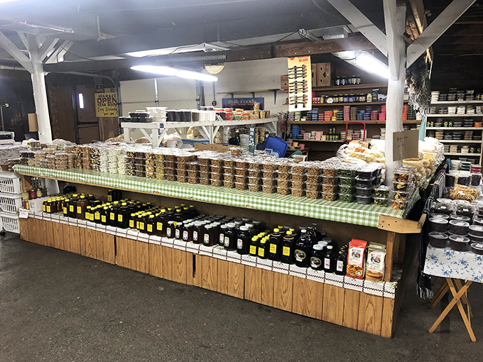 Rows of homemade preserves and honey jars &ndash; each one containing summer sunshine in a glass time capsule, waiting to brighten winter toast.