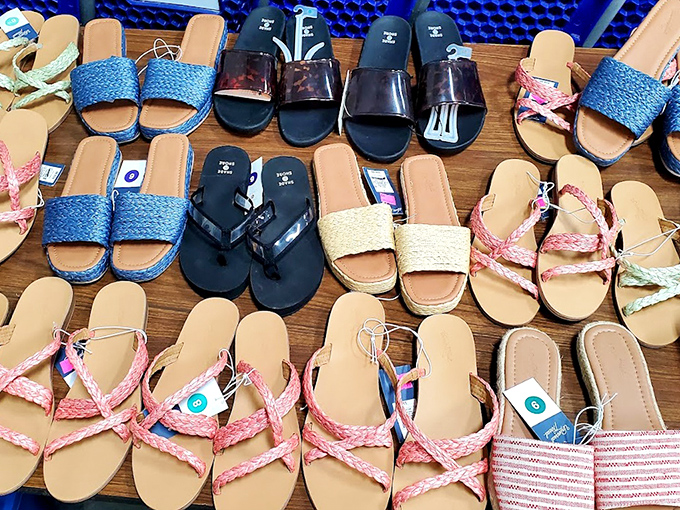 Summer sandals mingling with winter boots like seasons colliding in the best possible way.