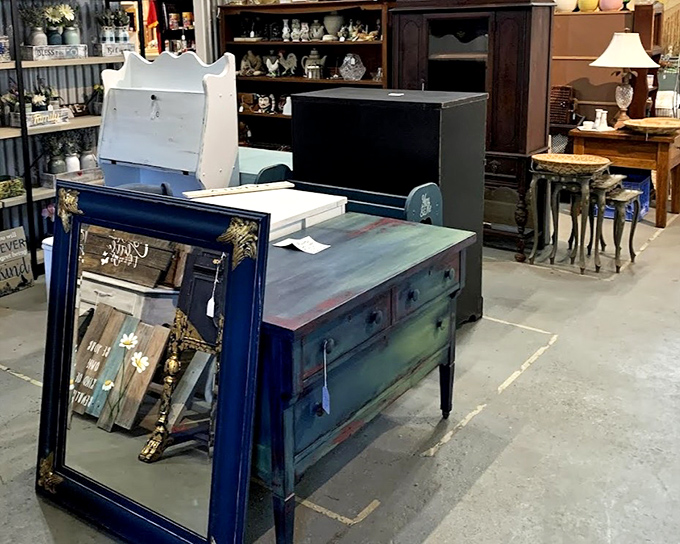 That blue dresser isn't just furniture; it's someone's childhood memories, grandmother's pride, and your next conversation piece all rolled into one.