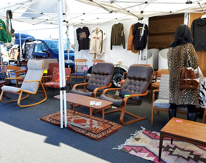 Mid-century modern meets contemporary cool in this furniture display. That rocking chair is practically begging you to imagine it in your living room.