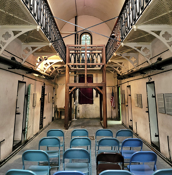 The central hall where justice was administered features a gallows structure that puts today's courtroom dramas into stark perspective.