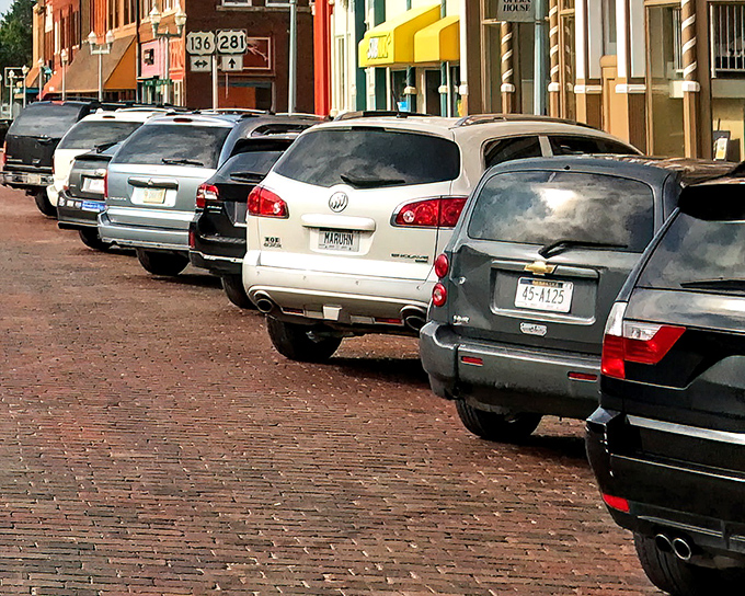 Parallel parking hasn't changed in a century. The historic downtown's brick streets have witnessed generations of Nebraskans going about their daily business.