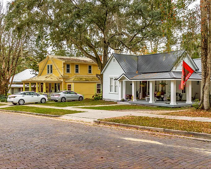 Sunshine yellow meets crisp white in this charming residential street. The only thing missing? A lemonade stand and someone yelling "dinner's ready!"